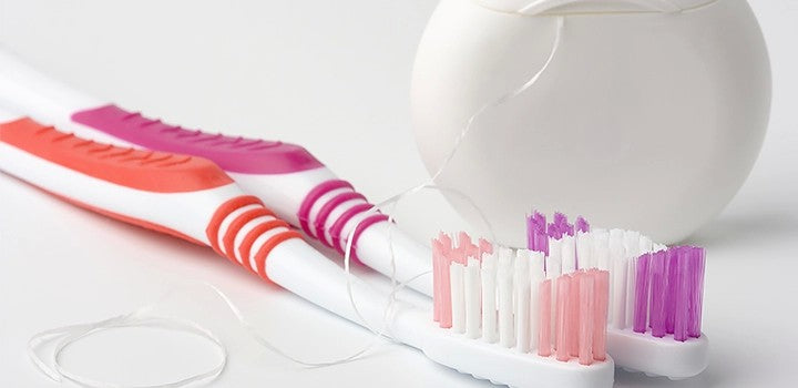 Flossing & Brushing: Which Should You Do First? | Triple Bristle